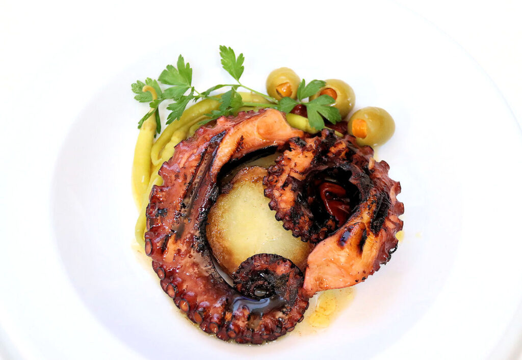 Grilled Braised Octopus with Potatoes, Olives, Peppers, and Sherry ...